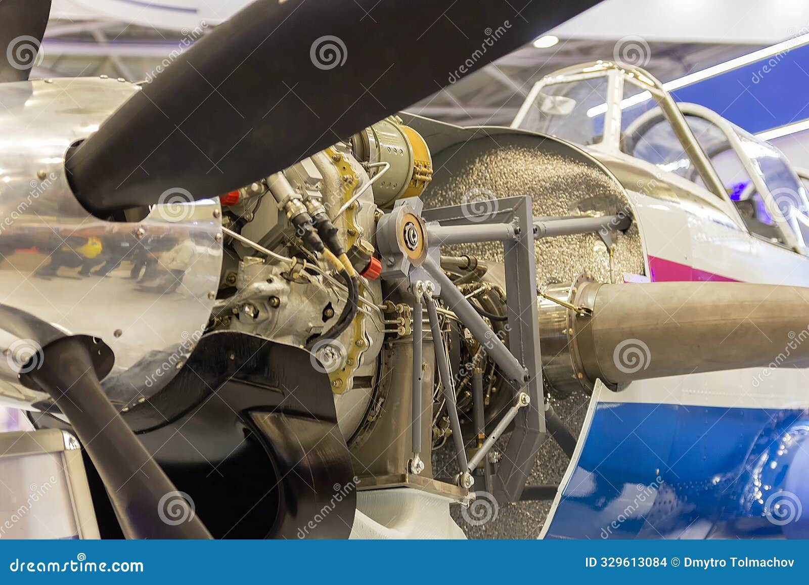 Open Engine Compartment of an Airplane at an Aviation Exhibition ...