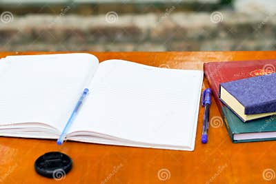 A Open Exercise Book on a Table.black Stock Image - Image of letter ...