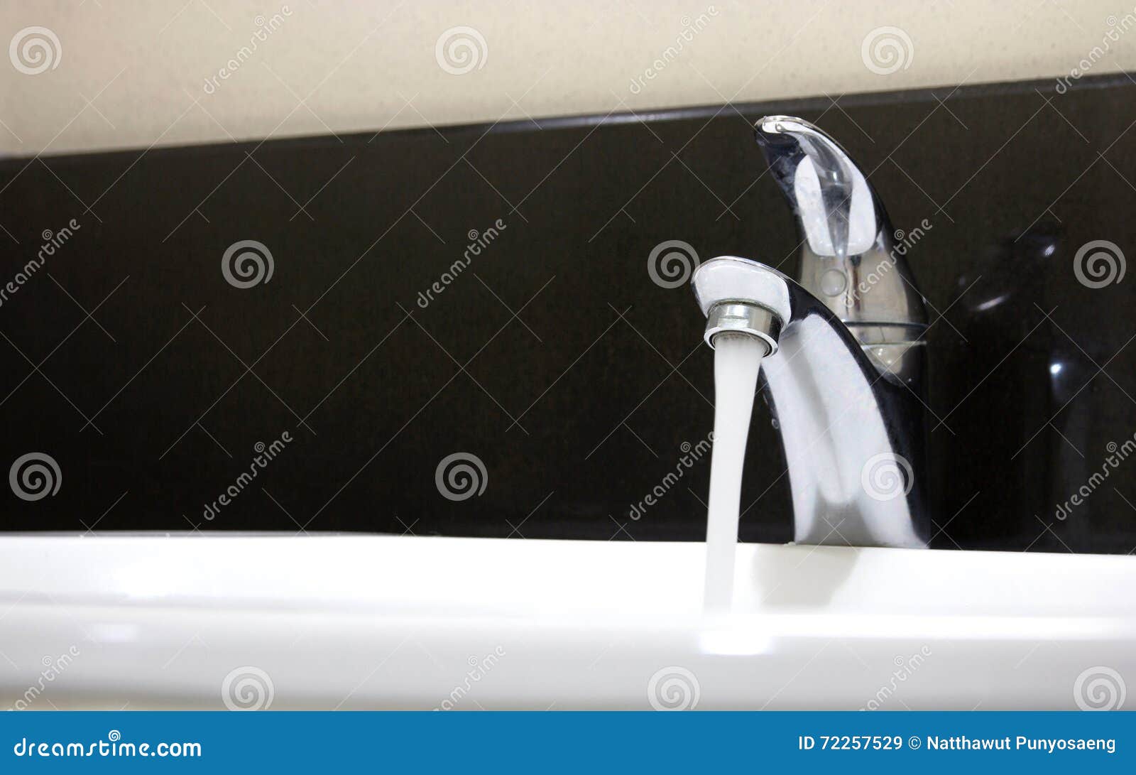 Open faucet and water flow stock image. Image of flow - 72257529