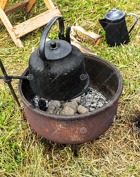 Open fire cooking stock image. Image of cook, fire, iron - 37388969