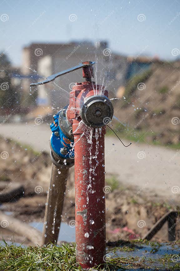 Open Fire Hydrant Spraying High Pressure Water Stock Image - Image of ...