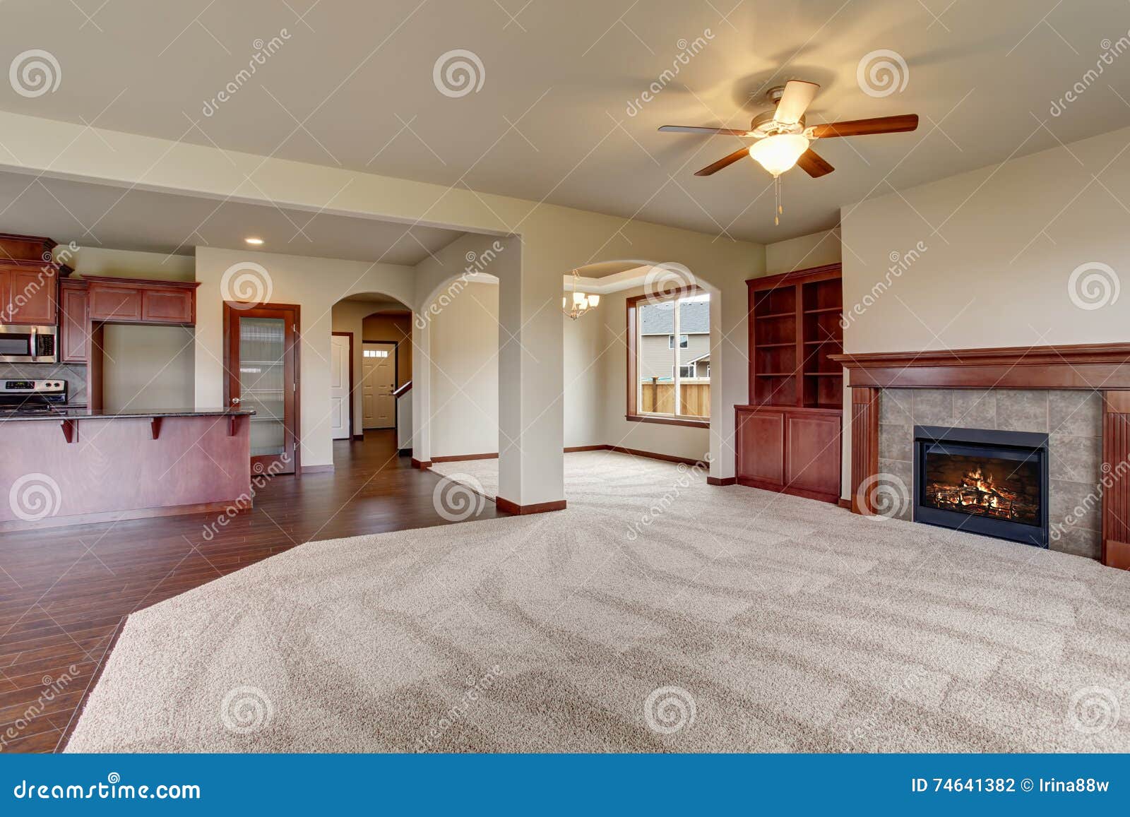 Open Floor Plan Interior with Carpet and Fireplace Stock Photo - Image ...