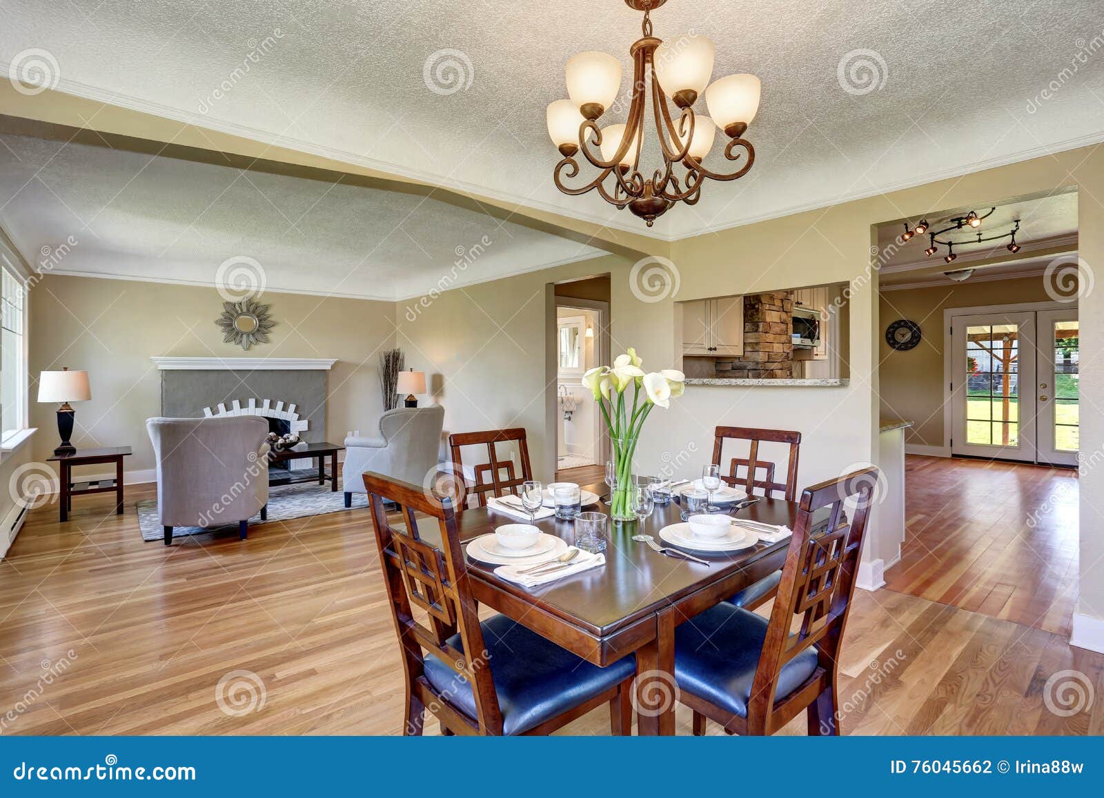 Open Floor Plan. View from Dining Area with Wooden Table Set Stock ...