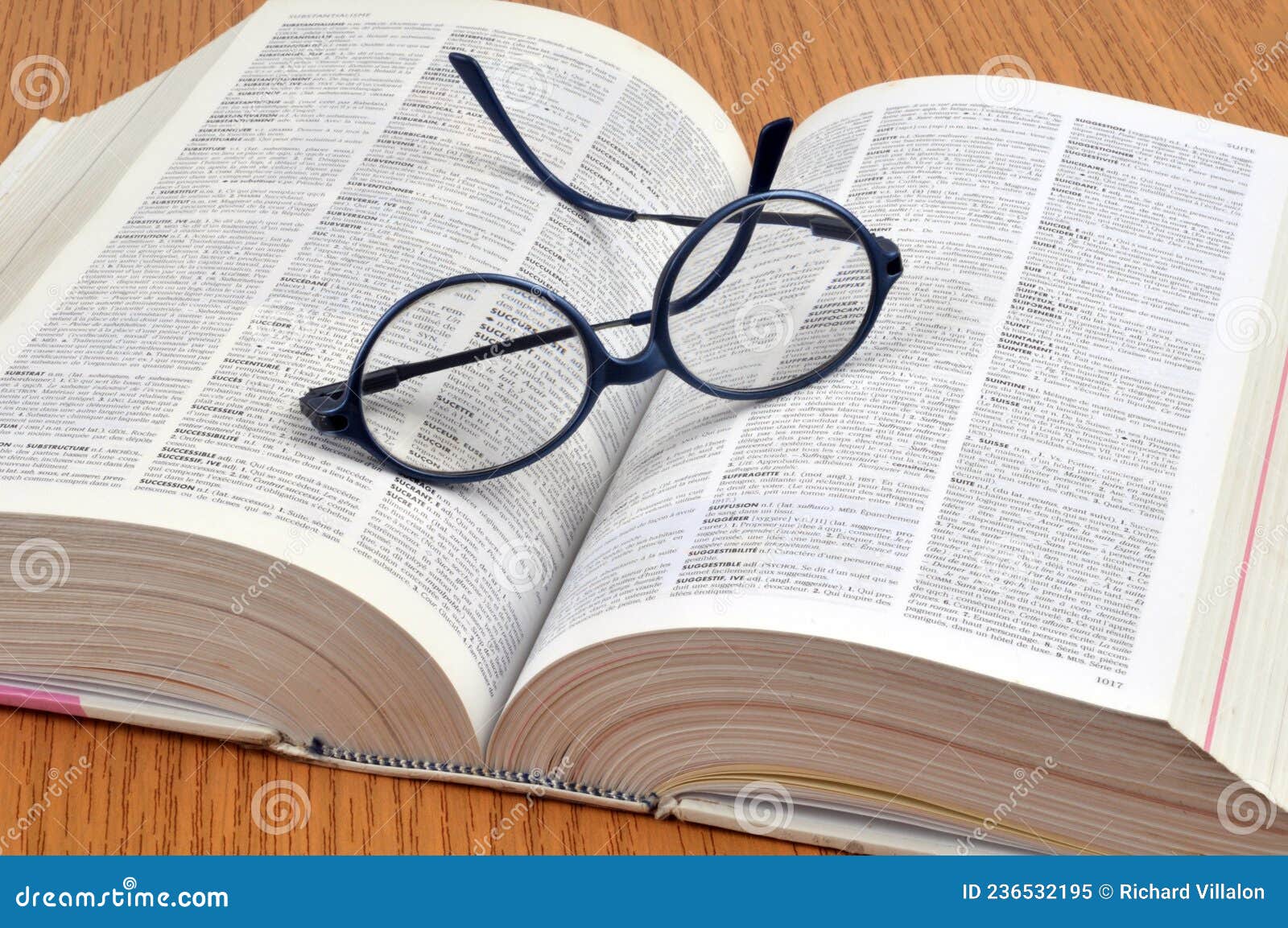 Open French Dictionary Lying on a Table with Glasses Editorial Image ...