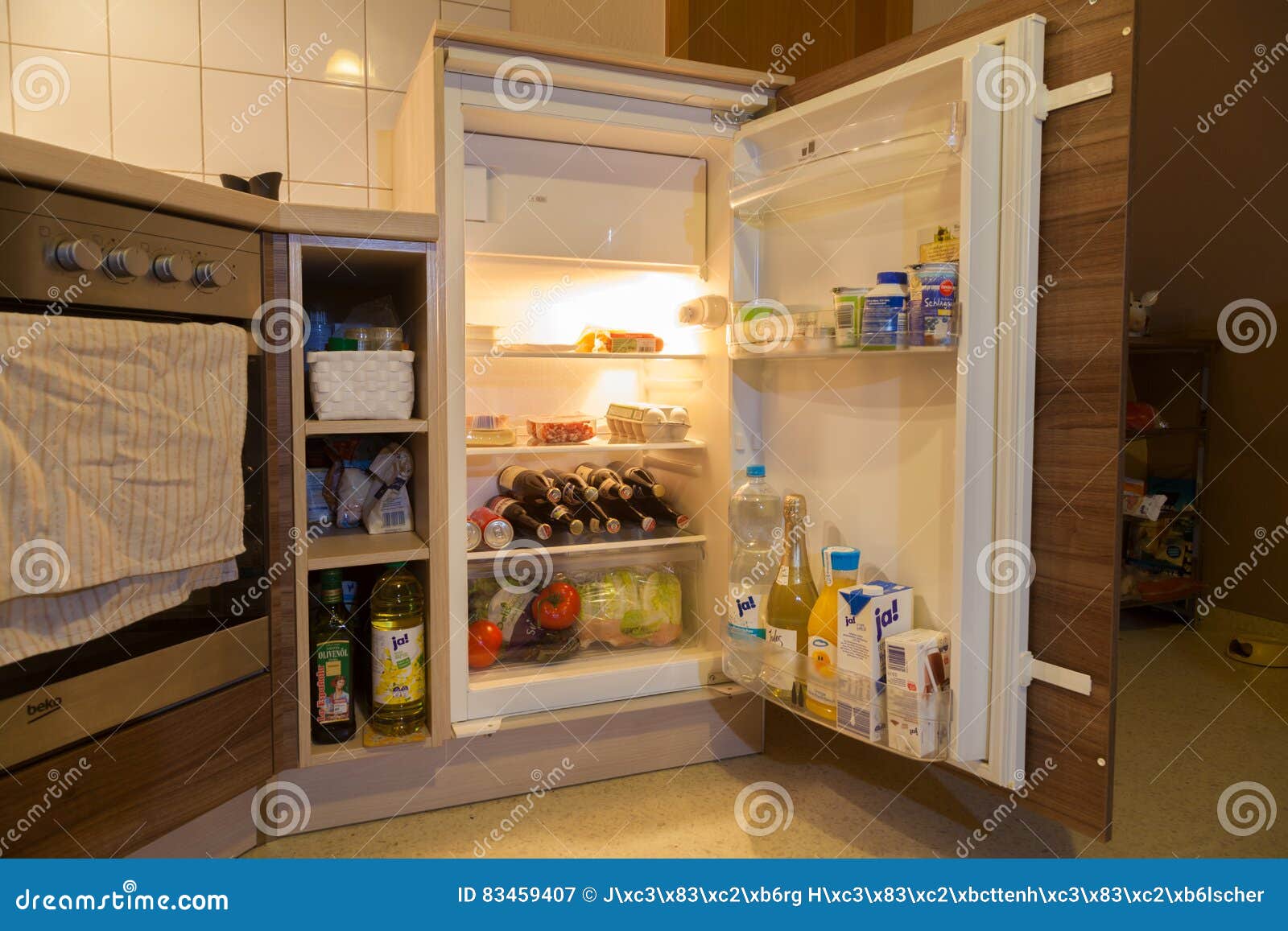 An open fridge editorial photography. Image of beer, stove - 83459407