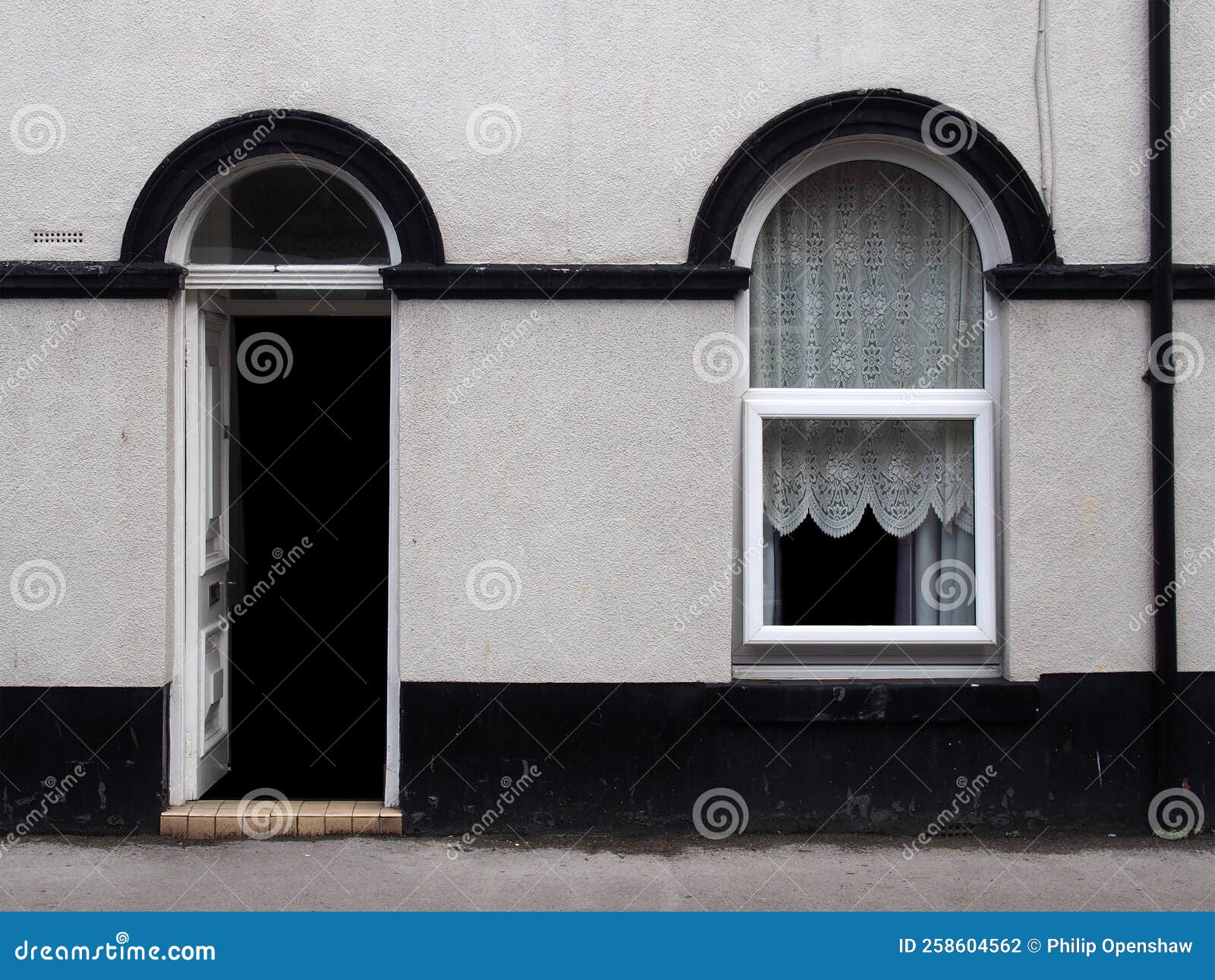 Open Front Door and Window of a Typical Old Brick British Terraced ...