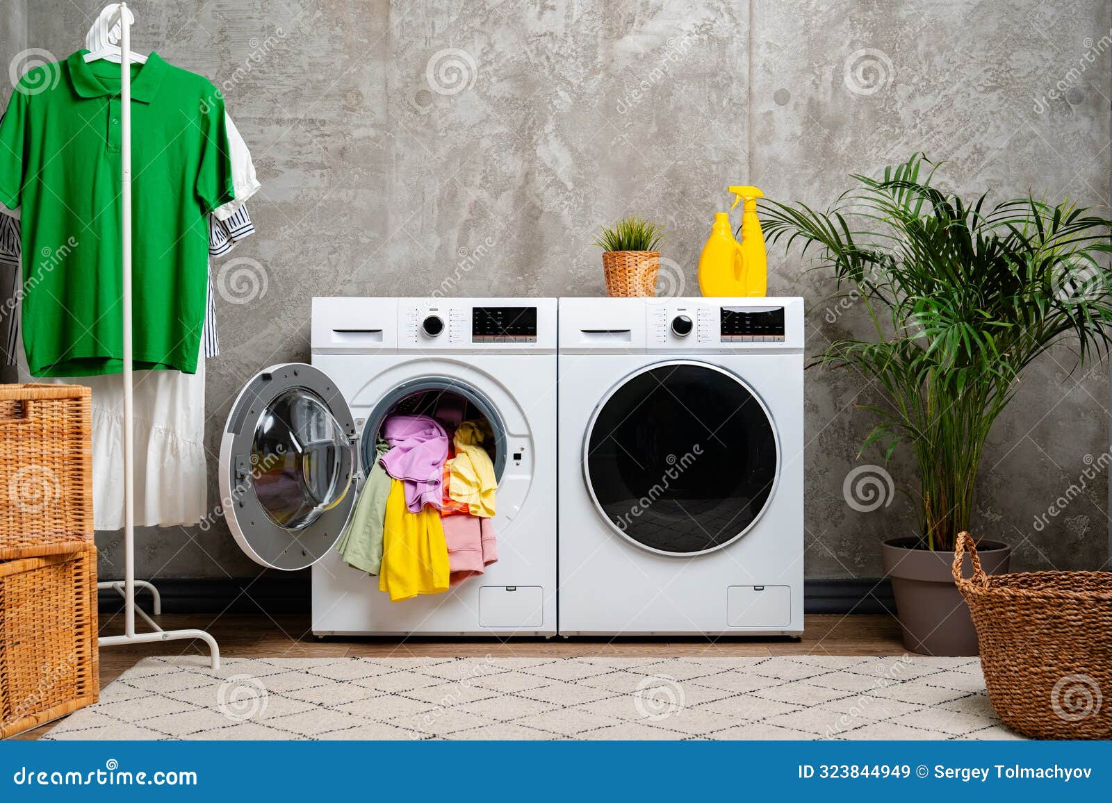 Open Front Loading Washing Machine with Colorful Clothes Stock Image ...