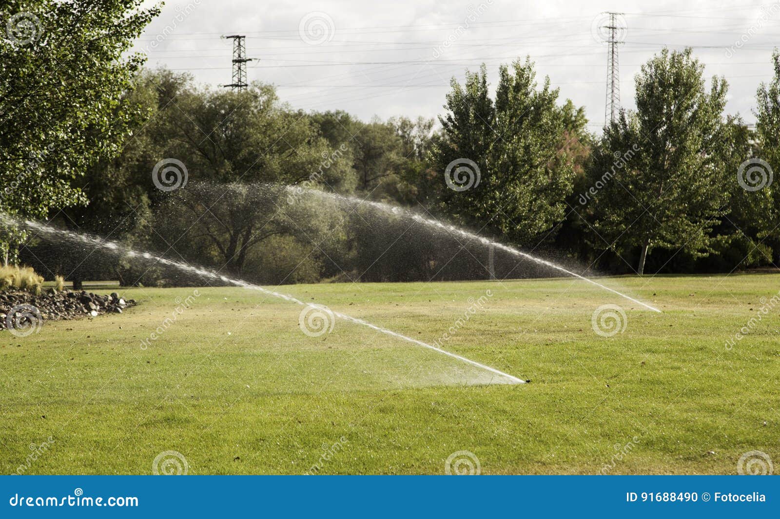 Open Garden Sprinklers stock photo. Image of landscape - 91688490