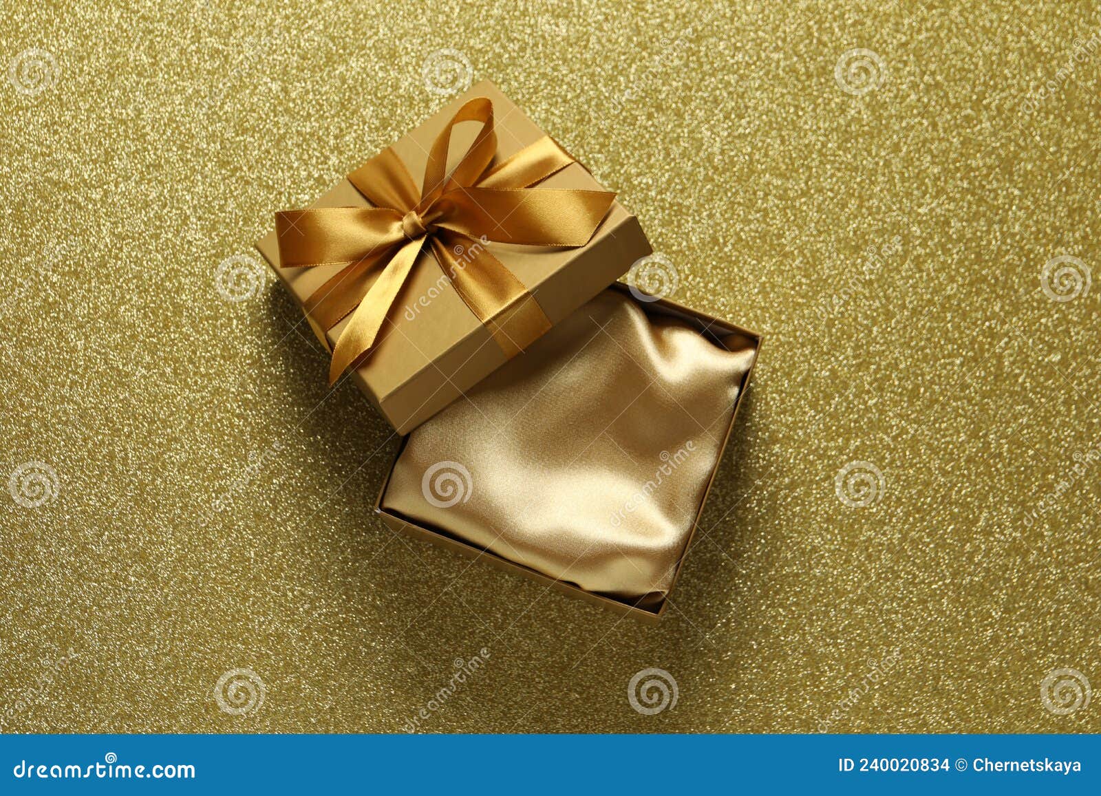 Open Gift Box on Golden Background, Top View Stock Photo - Image of ...