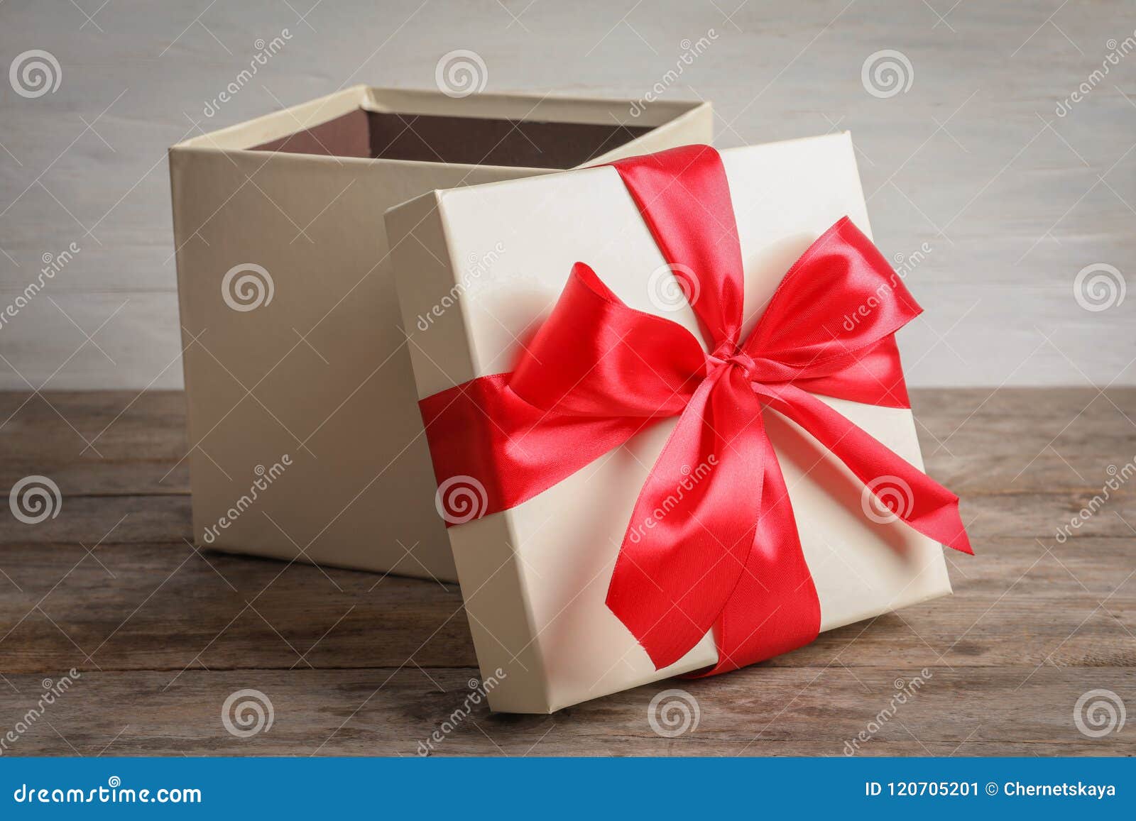 Open gift box on table stock image. Image of table, present - 120705201