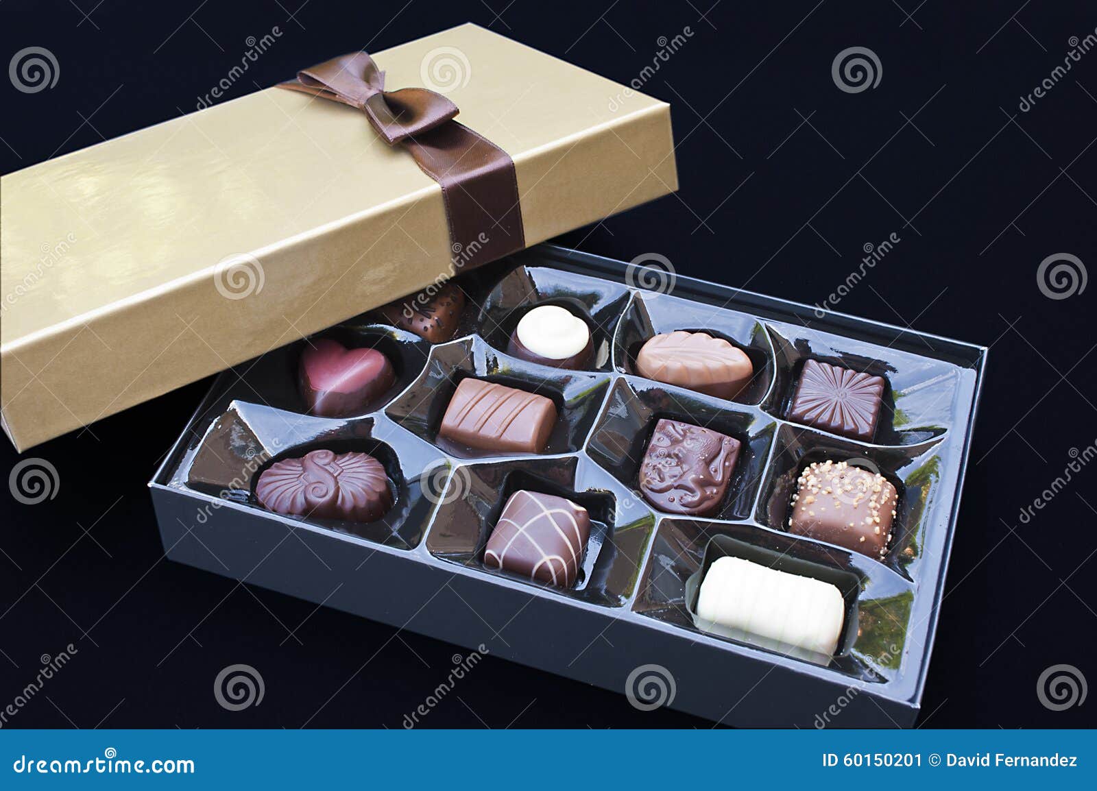 Open golden chocolate box stock image. Image of black - 60150201