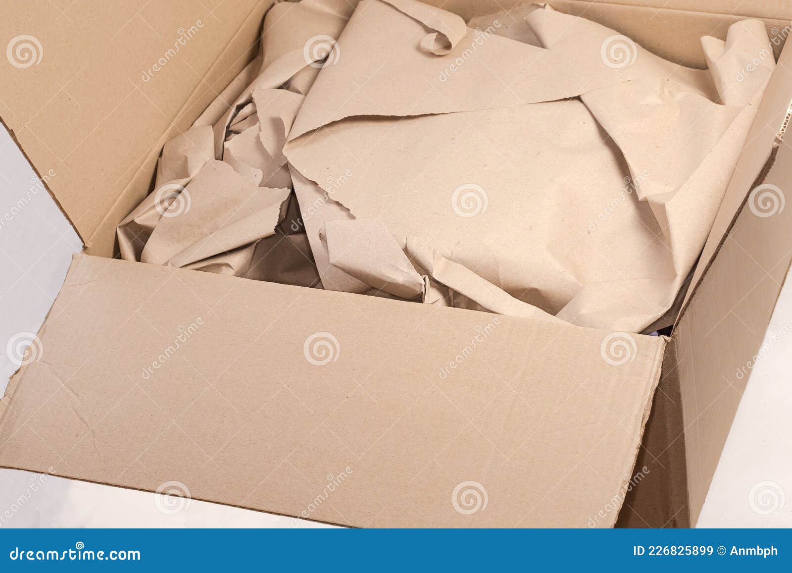 Open Gray Brown Corrugated Packing Box with Wrapping Paper Inside Stock ...