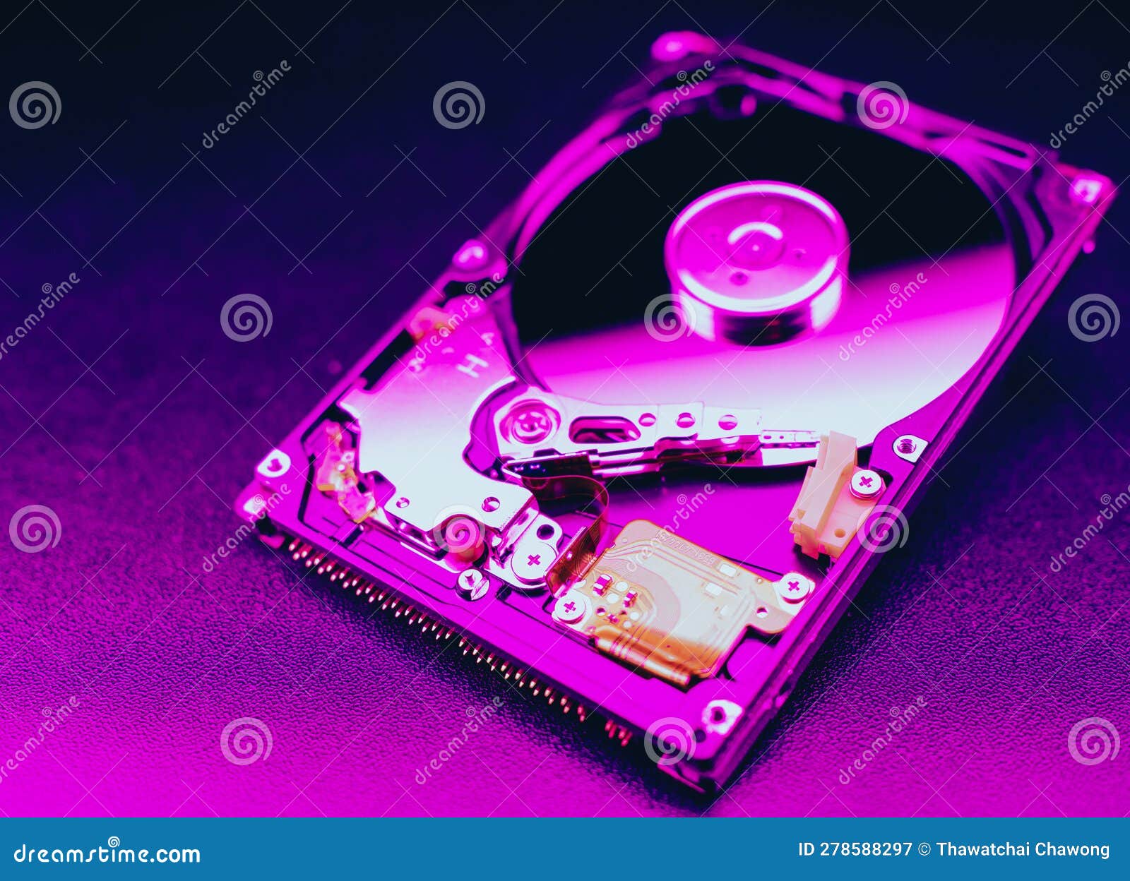 An Open Hard Disk Disassembled HDD of a Computer or Laptop Lies on a ...