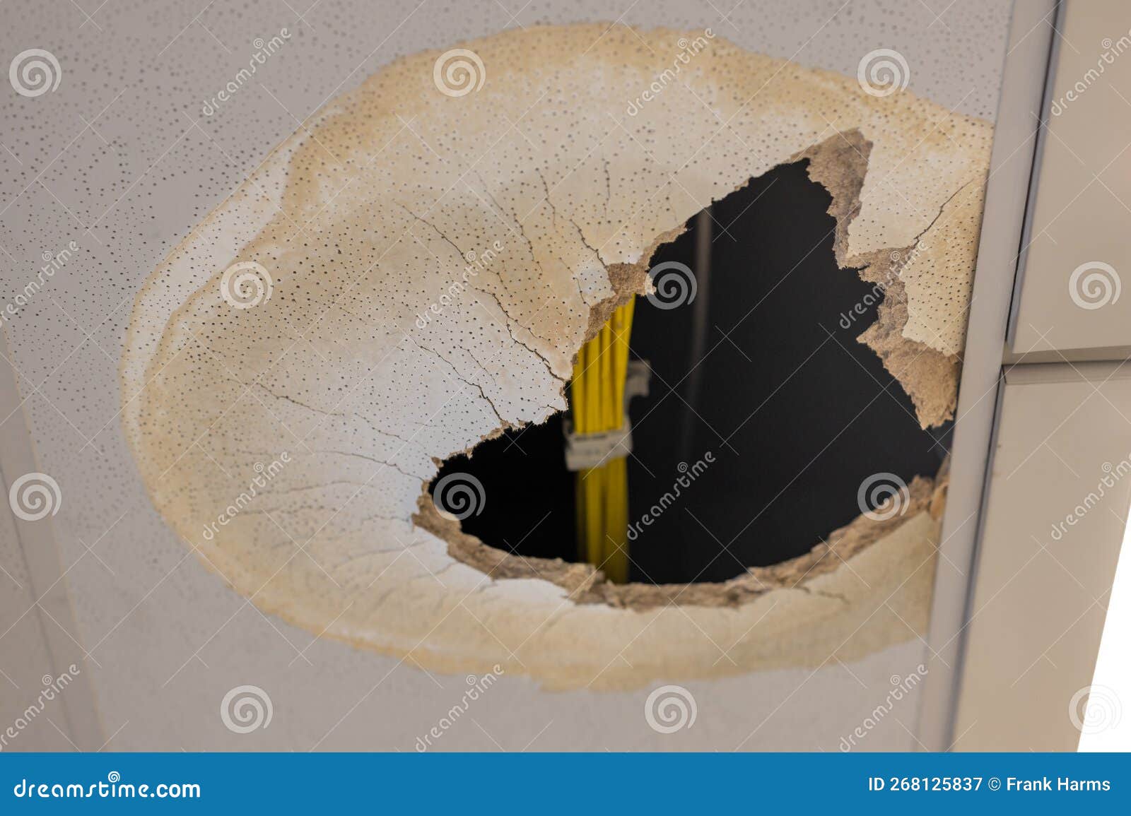 An Open Hole in the Ceiling Caused by a Water Damage. Stock Image ...