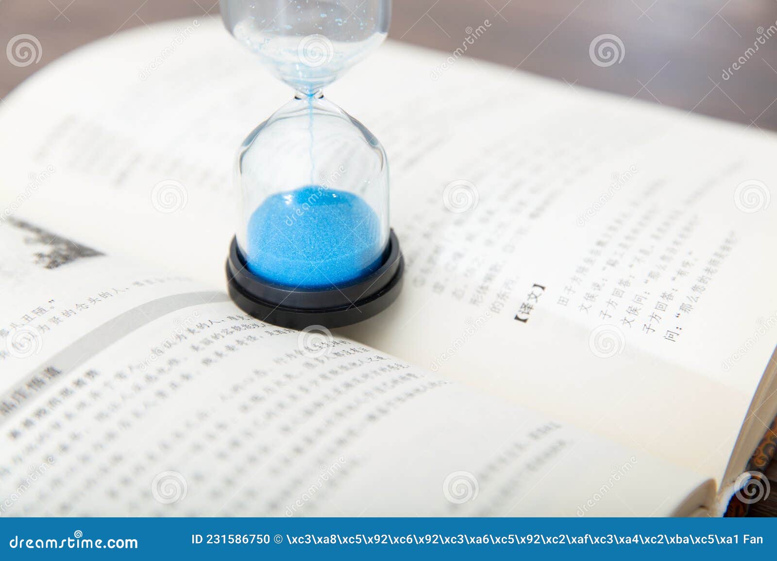 Open the Hourglass on Books Stock Photo - Image of still, time: 231586750