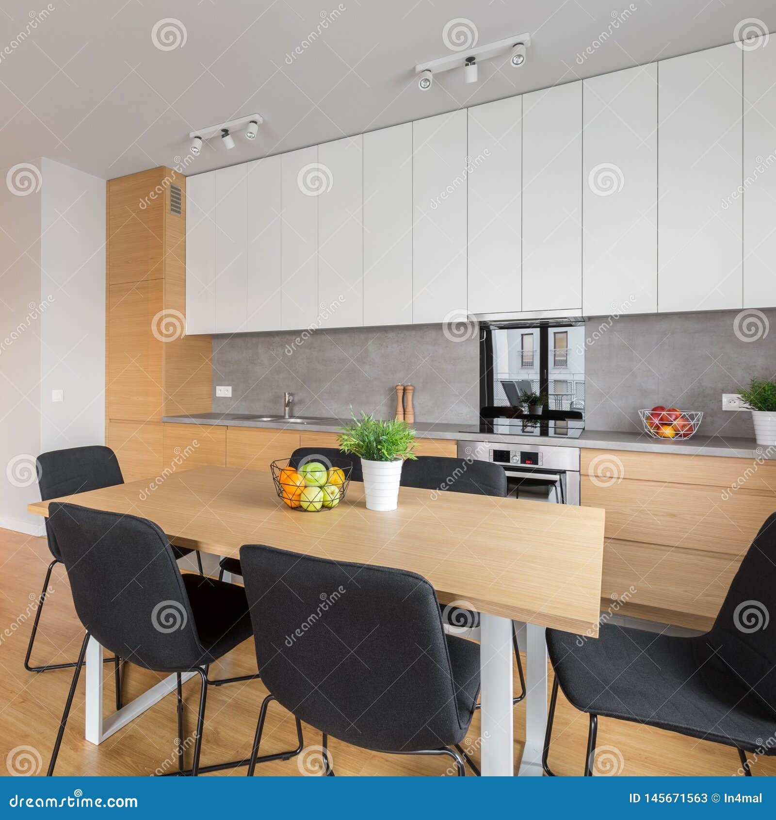 Open Kitchen with Wooden Table Stock Image - Image of house, apartment ...