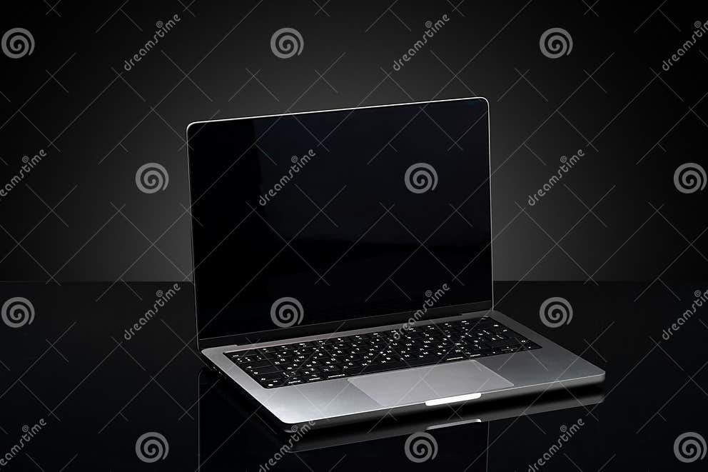 Open Laptop with Black Screen Against Black Background Stock Photo ...