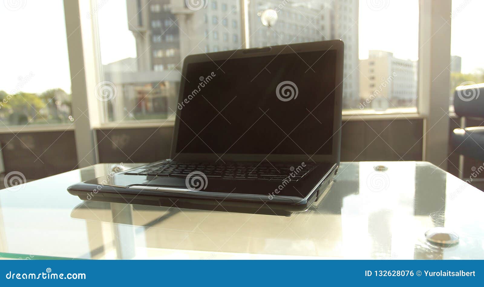 Open Laptop on Glass Table in Modern Office Stock Photo - Image of ...