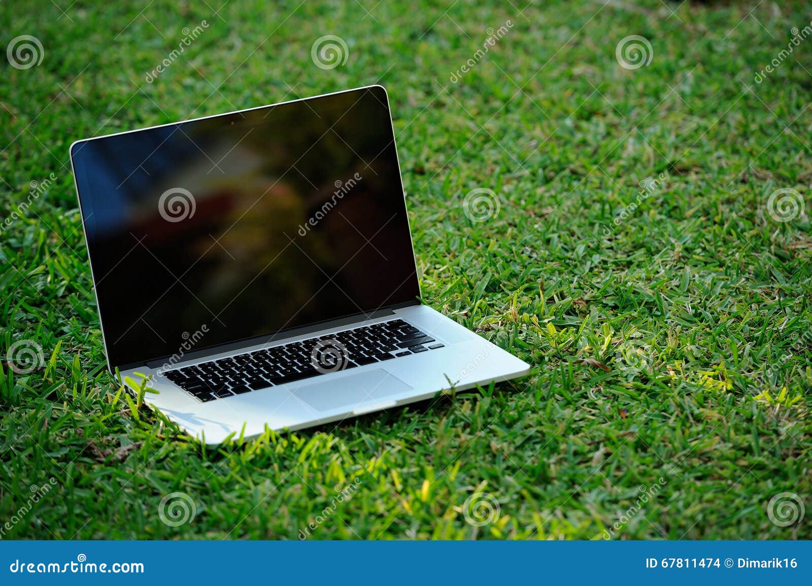 Open laptop on grass stock photo. Image of business, outside - 67811474