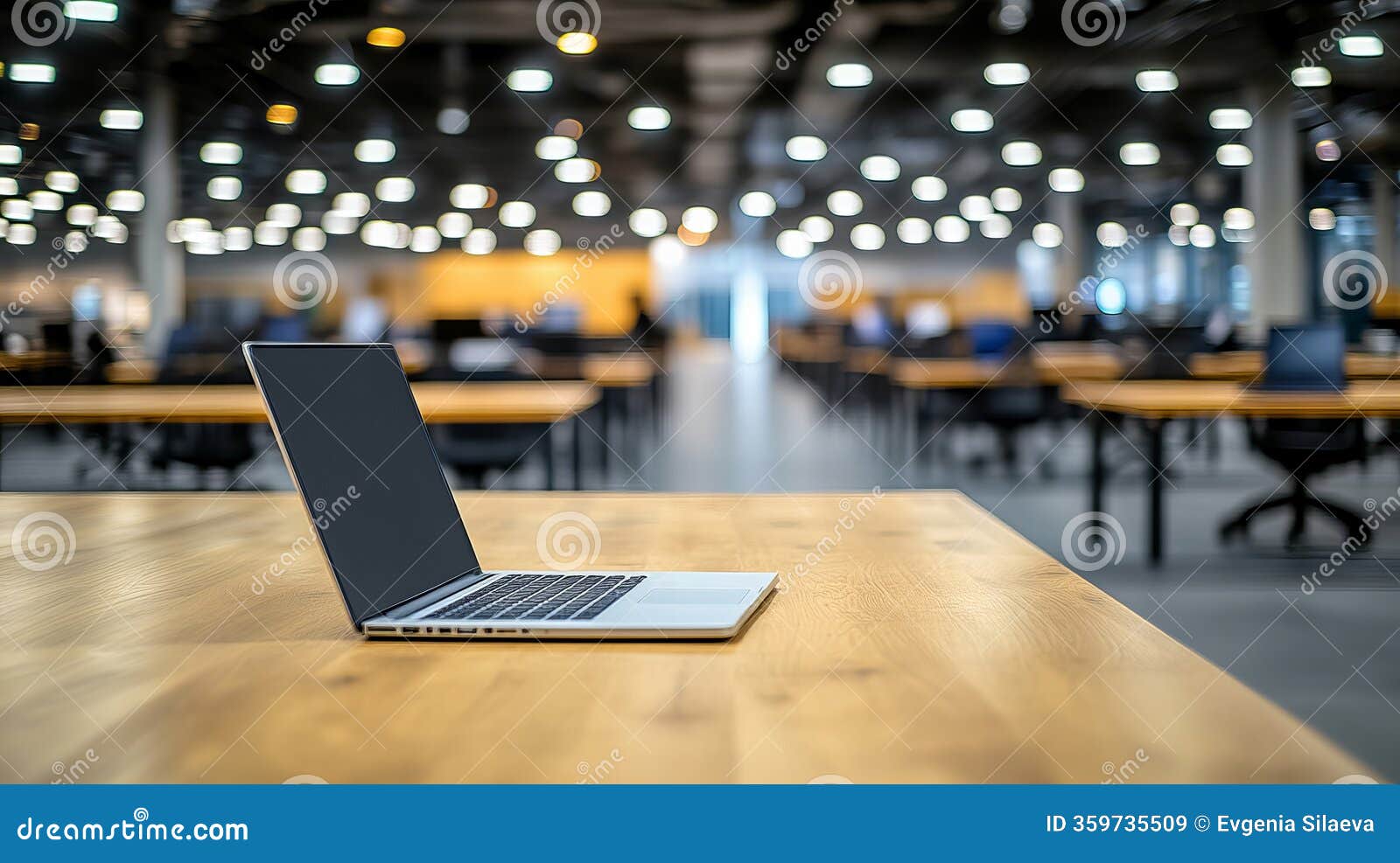 Open Laptop On Wooden Desk In Modern Co-working Space With Blurred ...
