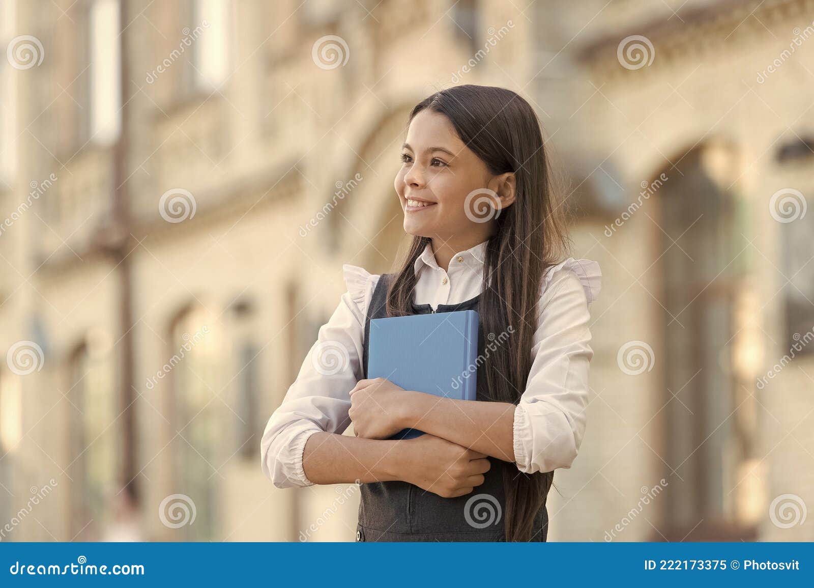 Open Lesson. Little Child Hold Lesson Book Outdoors. Back To School ...
