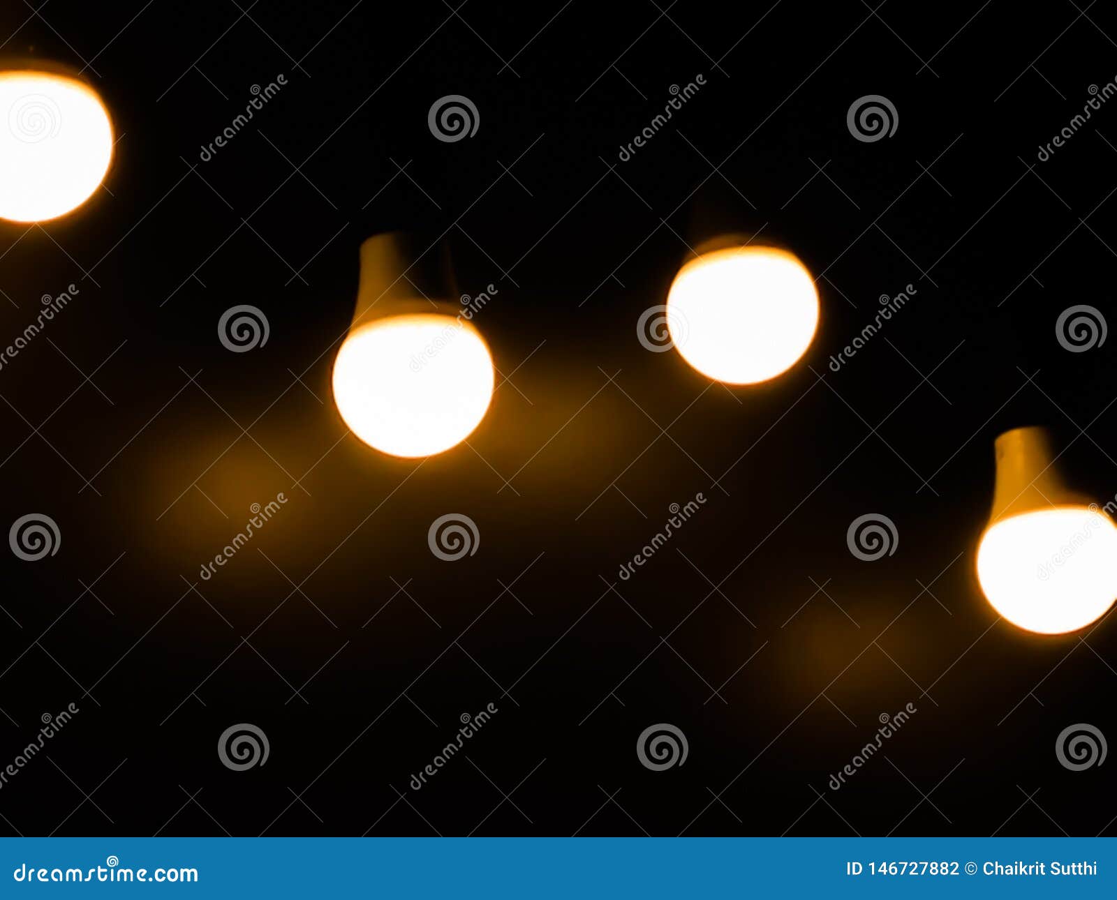 Open Orange Light Bulb on Black Background Stock Photo - Image of ...