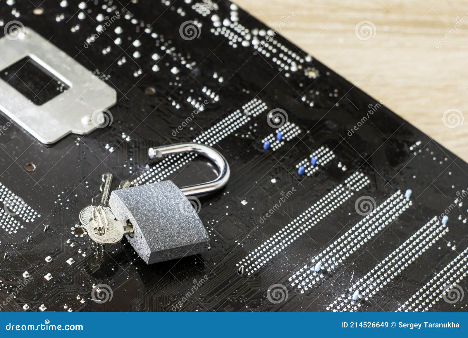 An Open Lock with Keys Lies on the Computer`s Motherboard the Concept ...