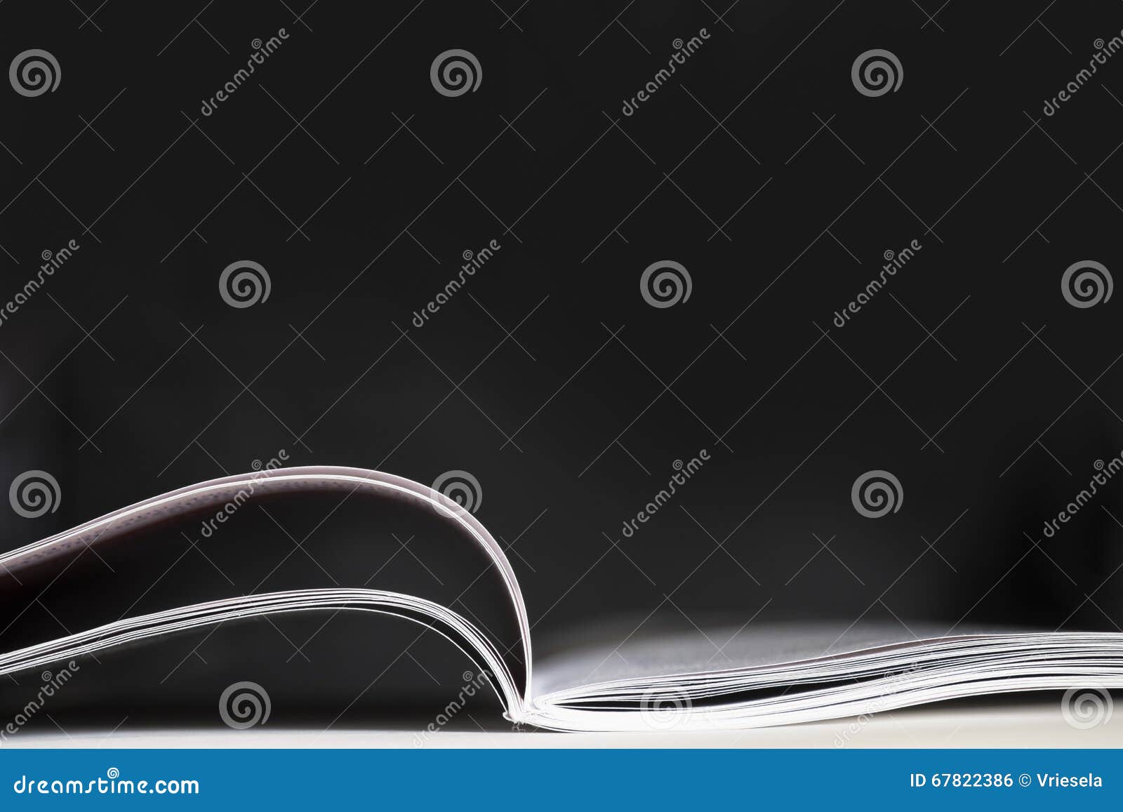 Open magazine on a table stock photo. Image of magazine - 67822386