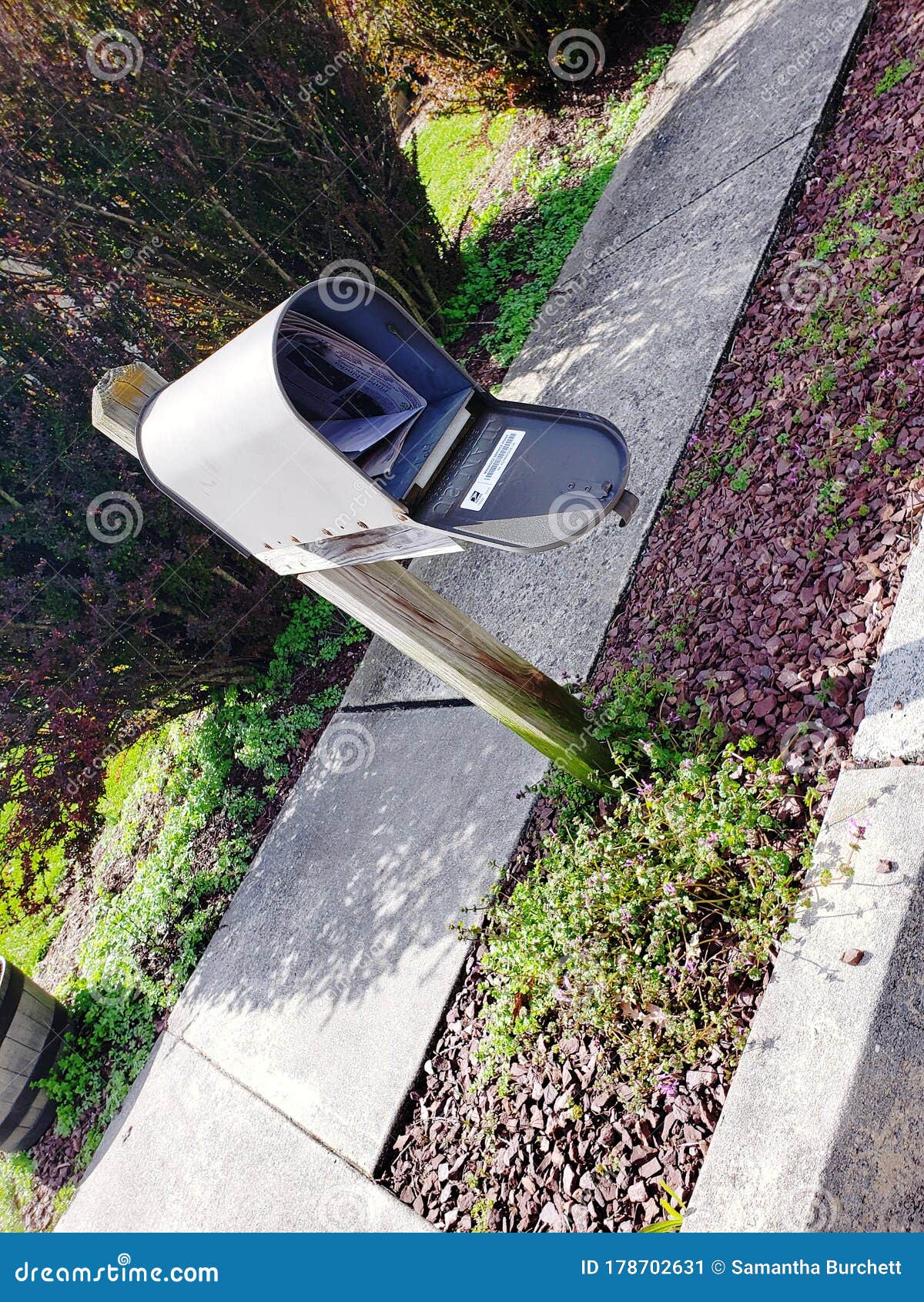 Open Mailbox on the Side of the Road Filled with Mail and Letters Stock ...