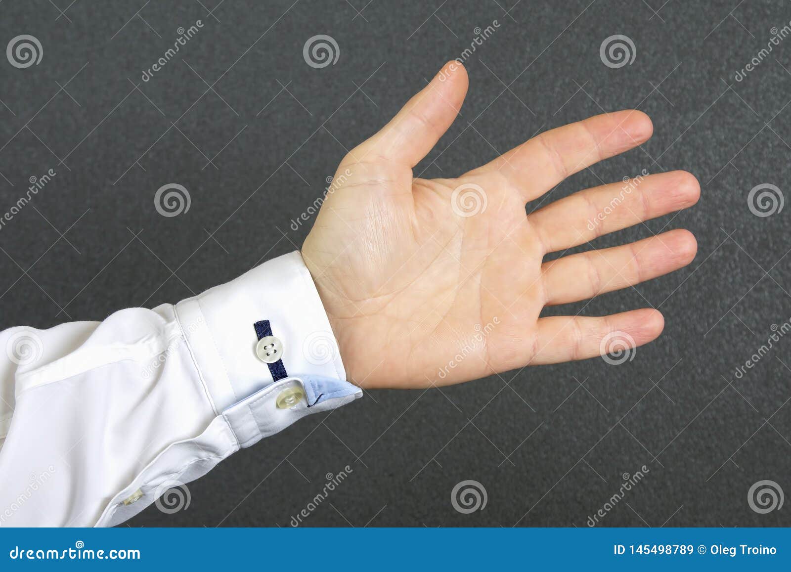 Open man`s hand in a shirt stock image. Image of human - 145498789