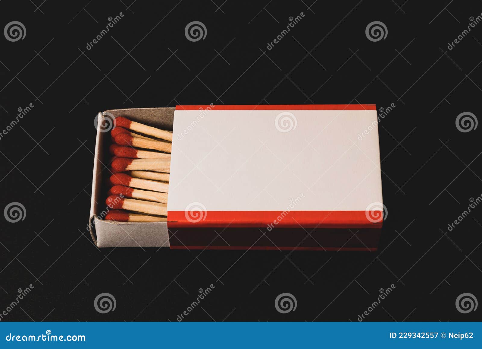 An Open Matchbox with a Blank White Label on a Black Table Stock Image ...