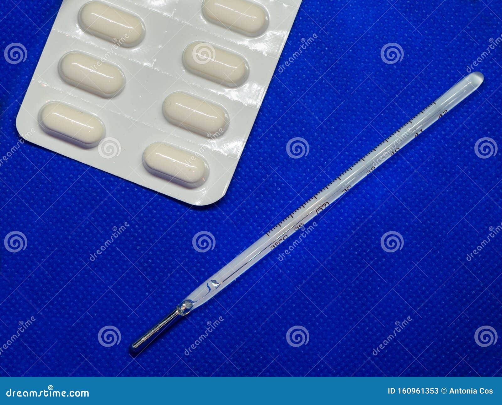 Open Medication Bottle with Pills and Thermometer. Stock Image - Image ...
