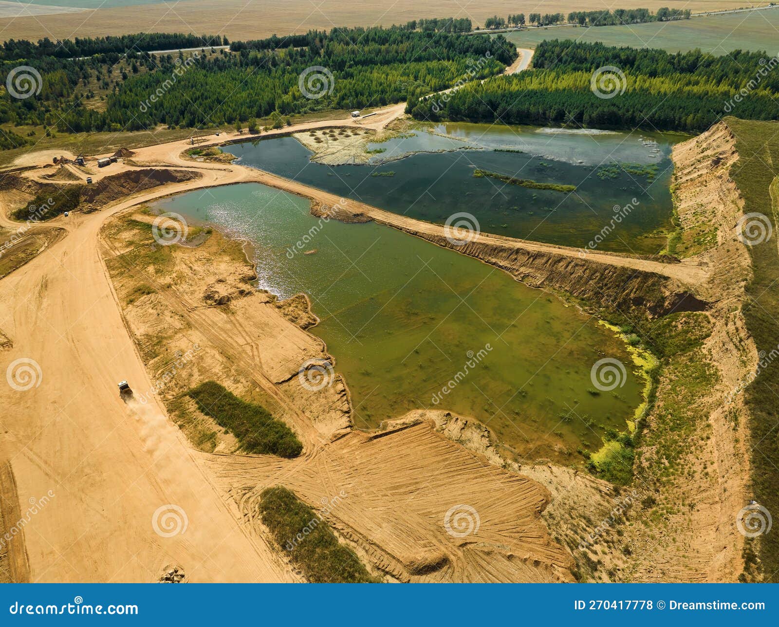 Open Mining of Constructing Sand from Illuminated Quarry Stock Photo ...