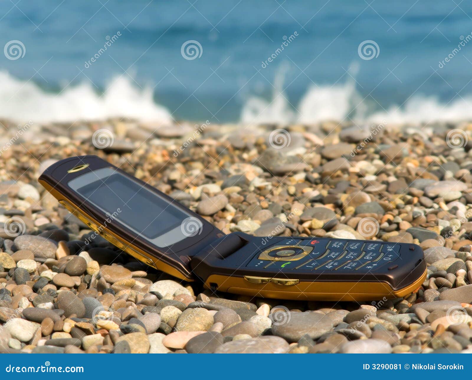 Open mobile phone on beach stock image. Image of nature - 3290081