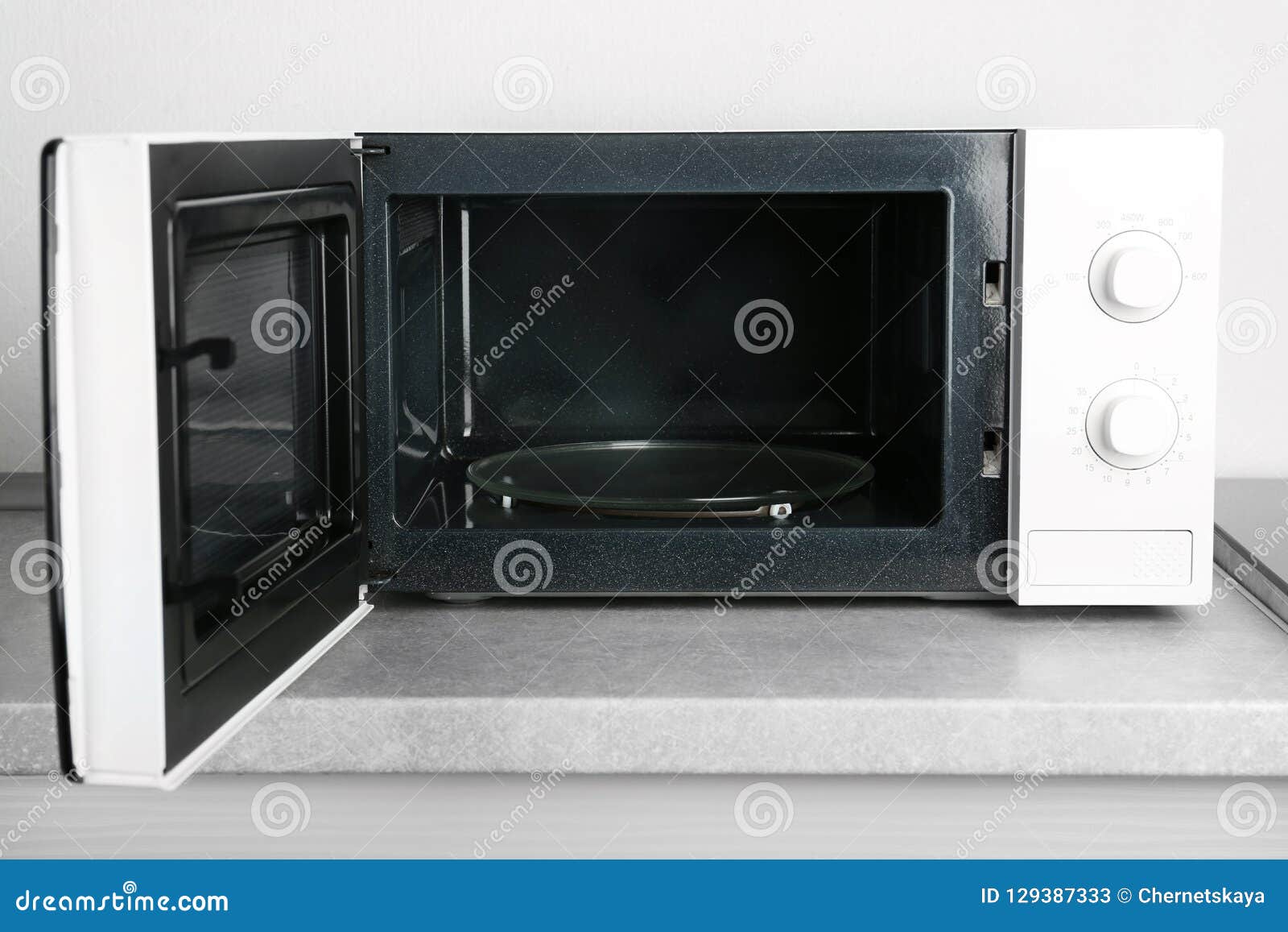 Open Modern Microwave Oven on Table Stock Image - Image of modern, door ...