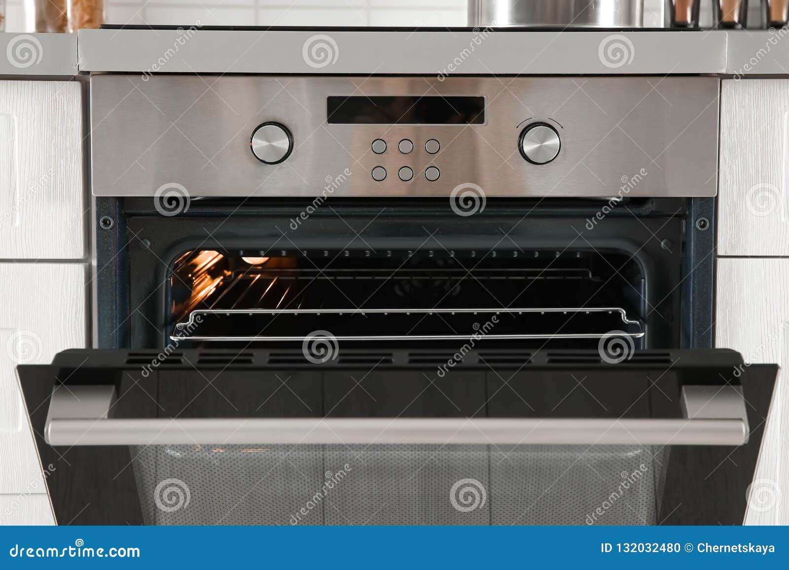 Open modern oven stock photo. Image of cabinet, convection - 132032480