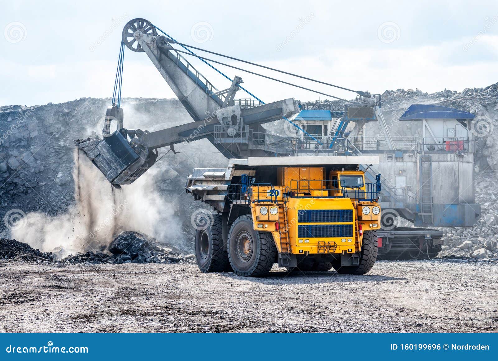 Open Mountain Quarry. Loading Coal into a Mining Truck Stock Photo ...