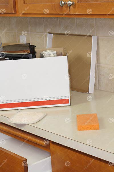 Open Moving Box on Kitchen Counter Stock Image - Image of vertical ...