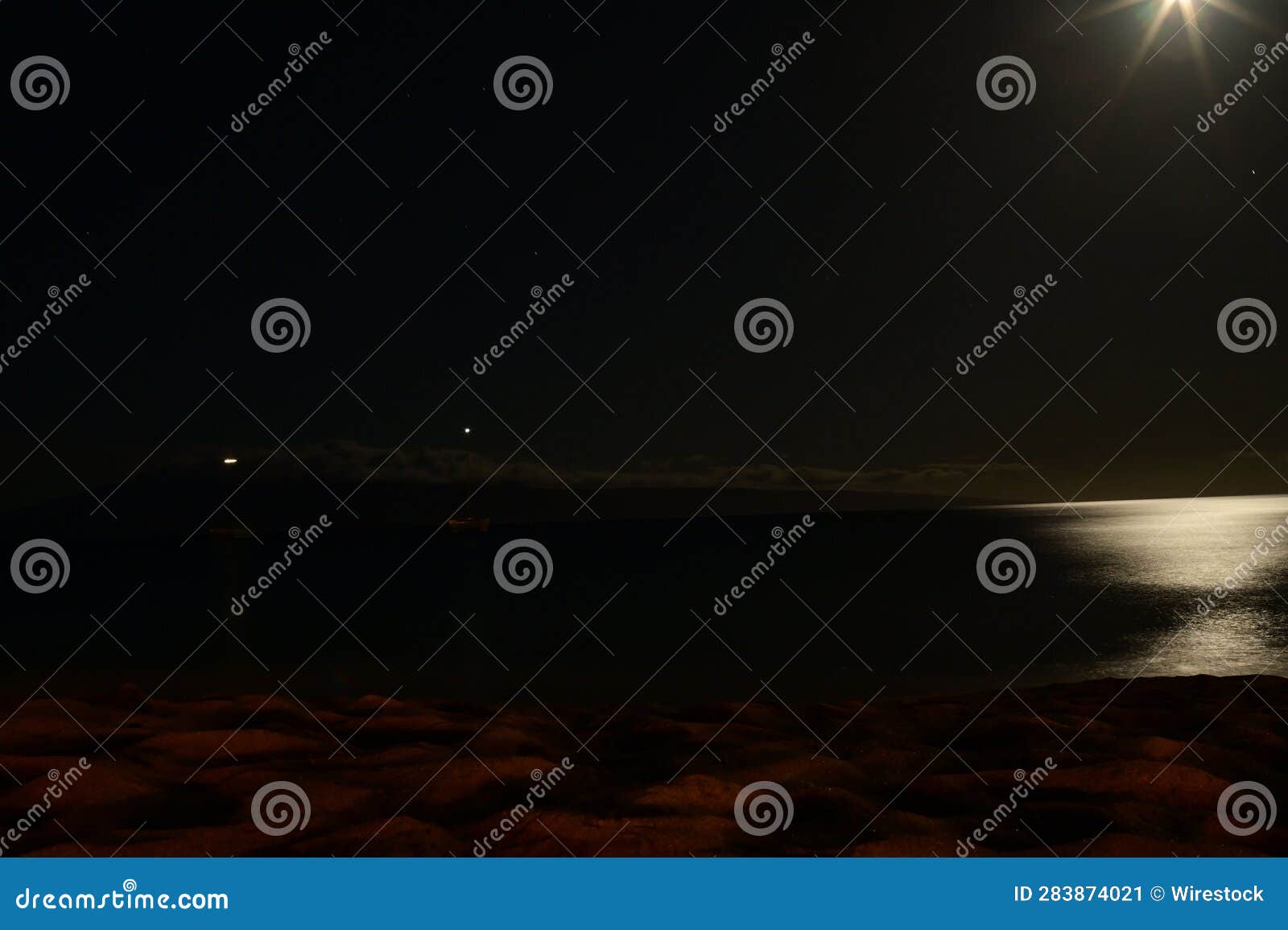 An Open Night Sky with a Large Moon and the Surface Lit Up Stock Image ...