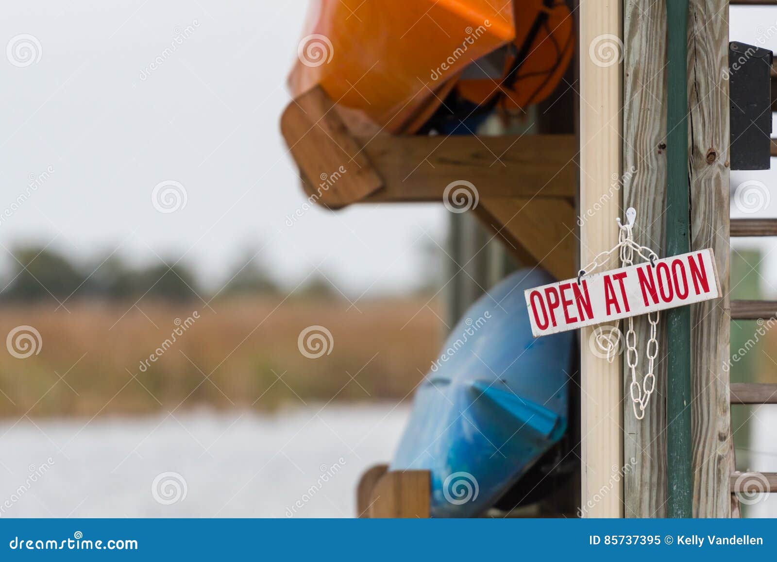 Open at Noon Sign with Two Kayaks Stock Image - Image of service, open ...