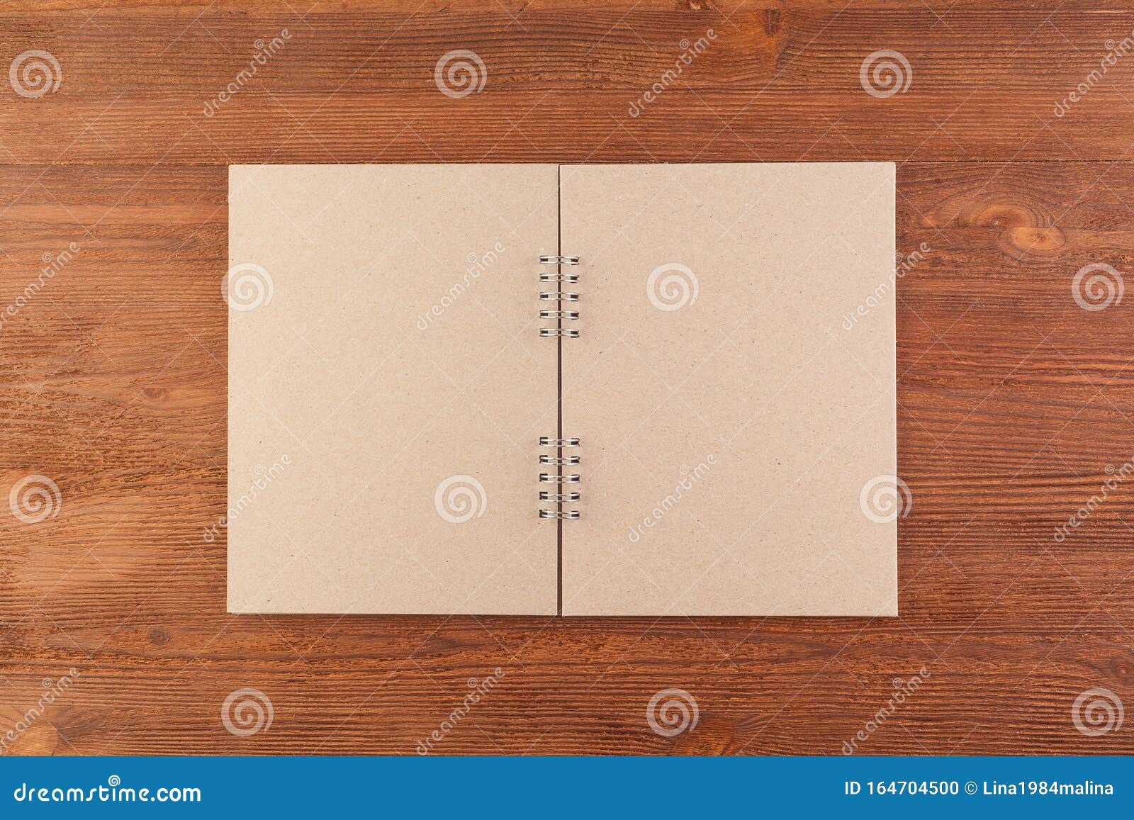 Open Notebook in Dark Paper Lying on a Wooden Table Stock Photo - Image ...
