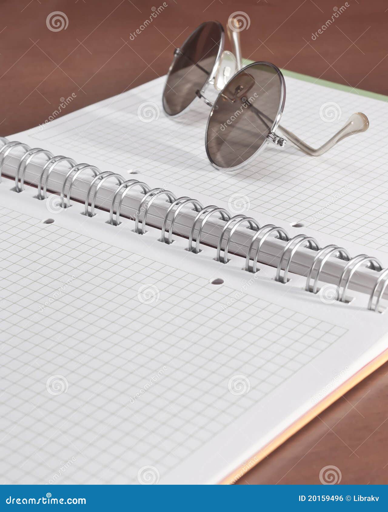 Open notebook and glasses stock photo. Image of event - 20159496