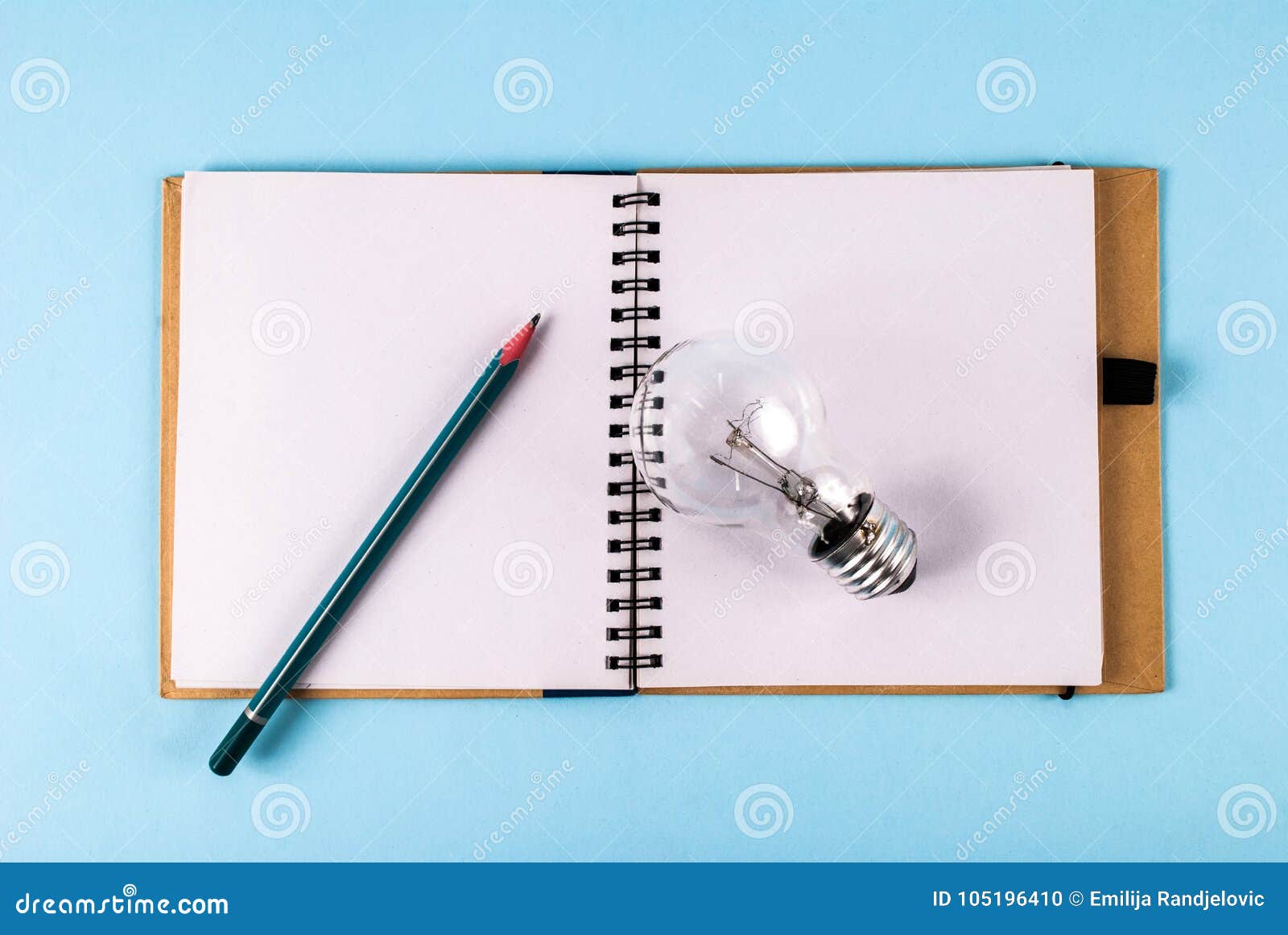 Creative Ideas and Inspiration: Open Notebook with Pen and Light Bulb ...