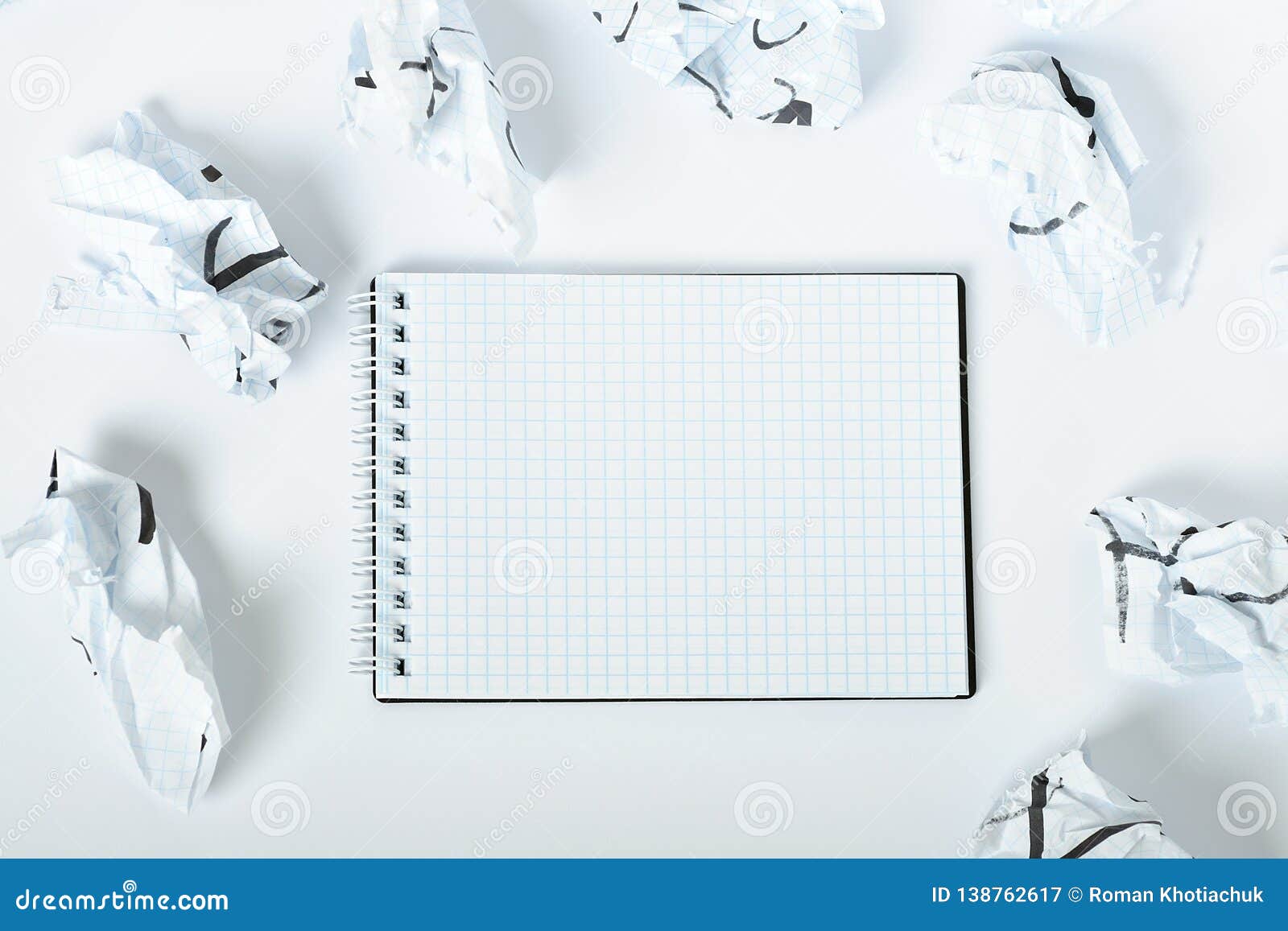 Open Notebook Surrounded by Crumpled Sheets of Paper. Stock Image ...