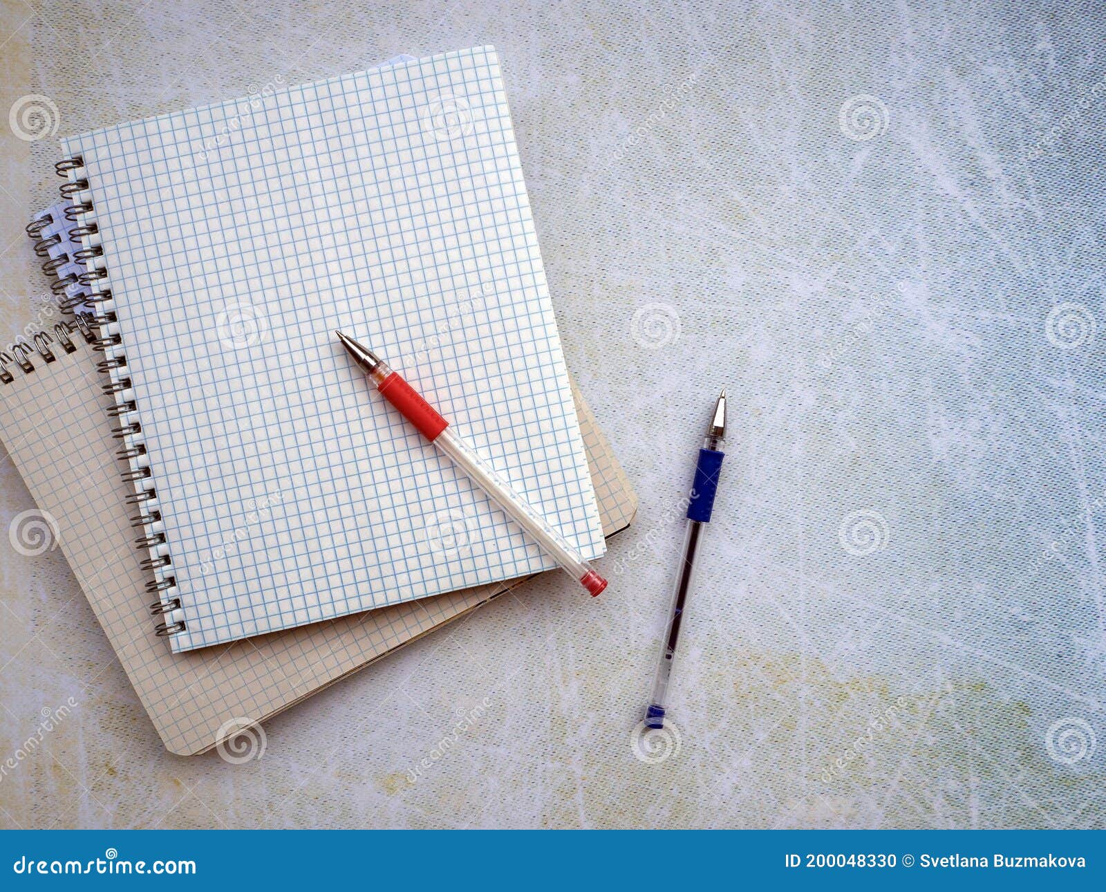 Open Notebooks are Stacked. the Checkered Pages of the Notebook are ...