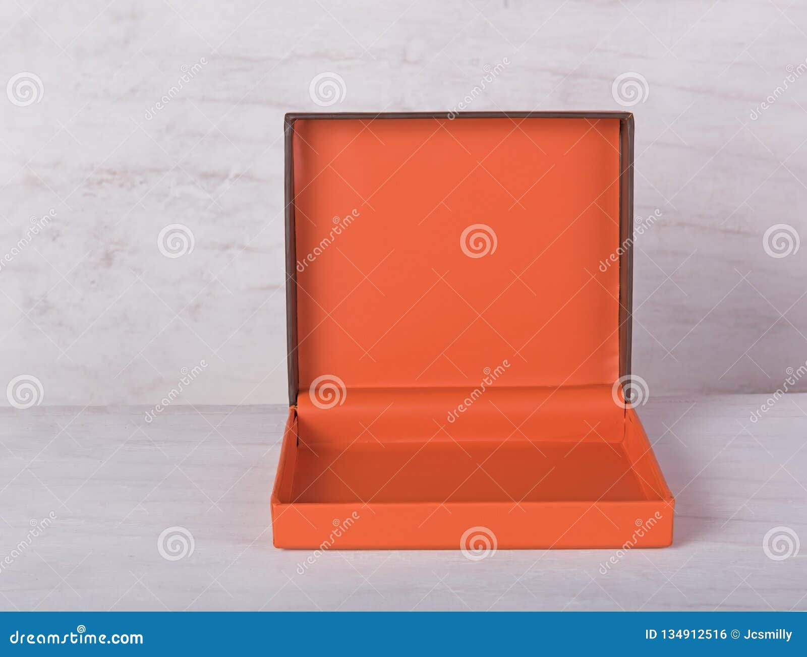 Open Orange Gift Box on Grunge White Wood Background Stock Photo ...