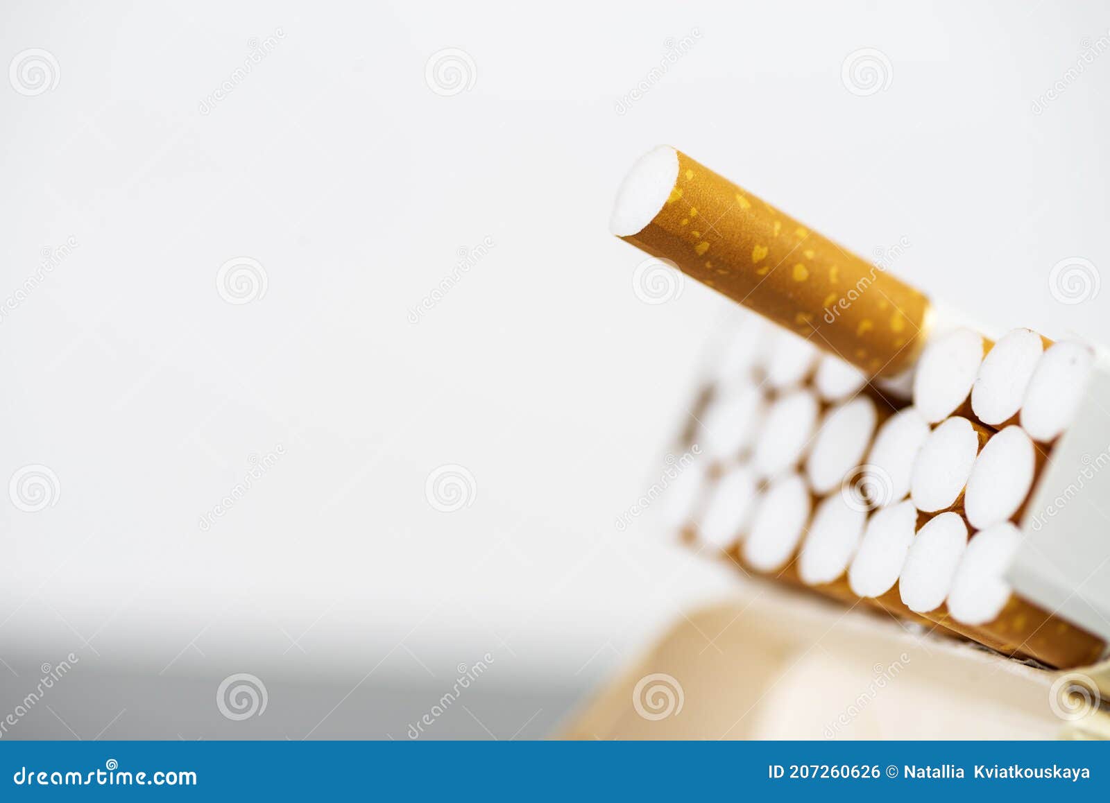 Open Pack of Cigarettes with One Outstretched Cigarette Close Up, Place ...
