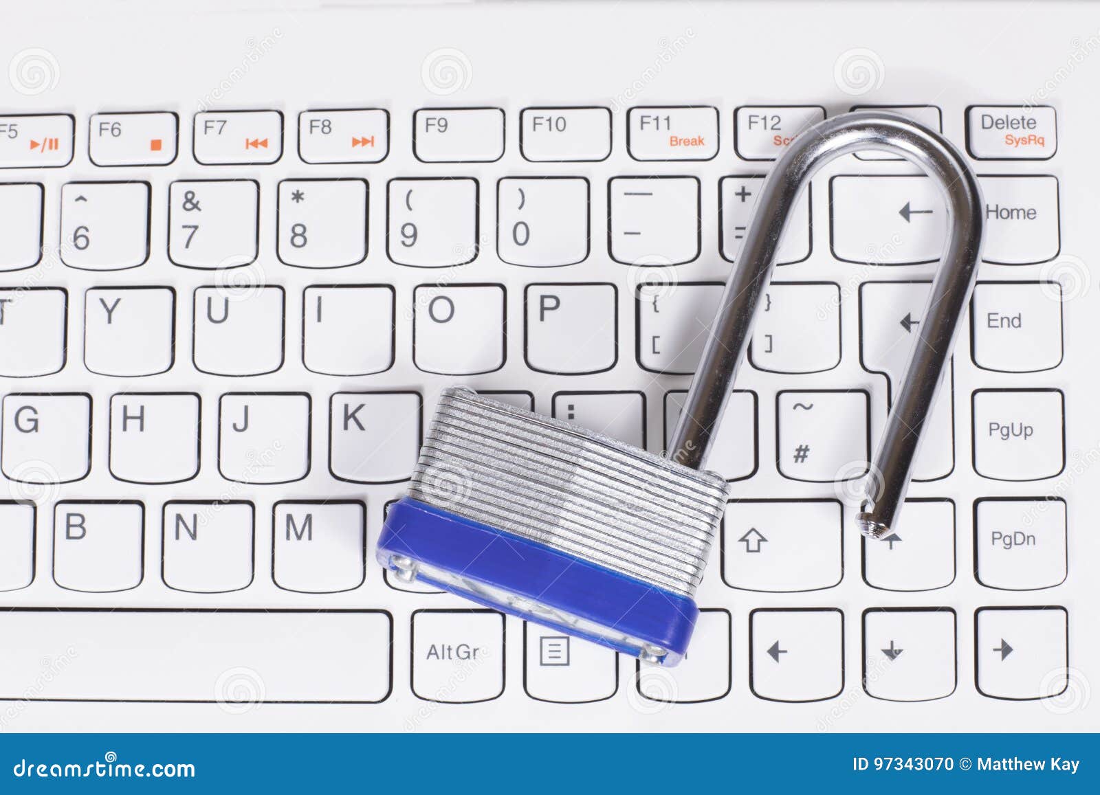 Open Padlock Lying on Computer Keyboard Stock Photo - Image of safety ...