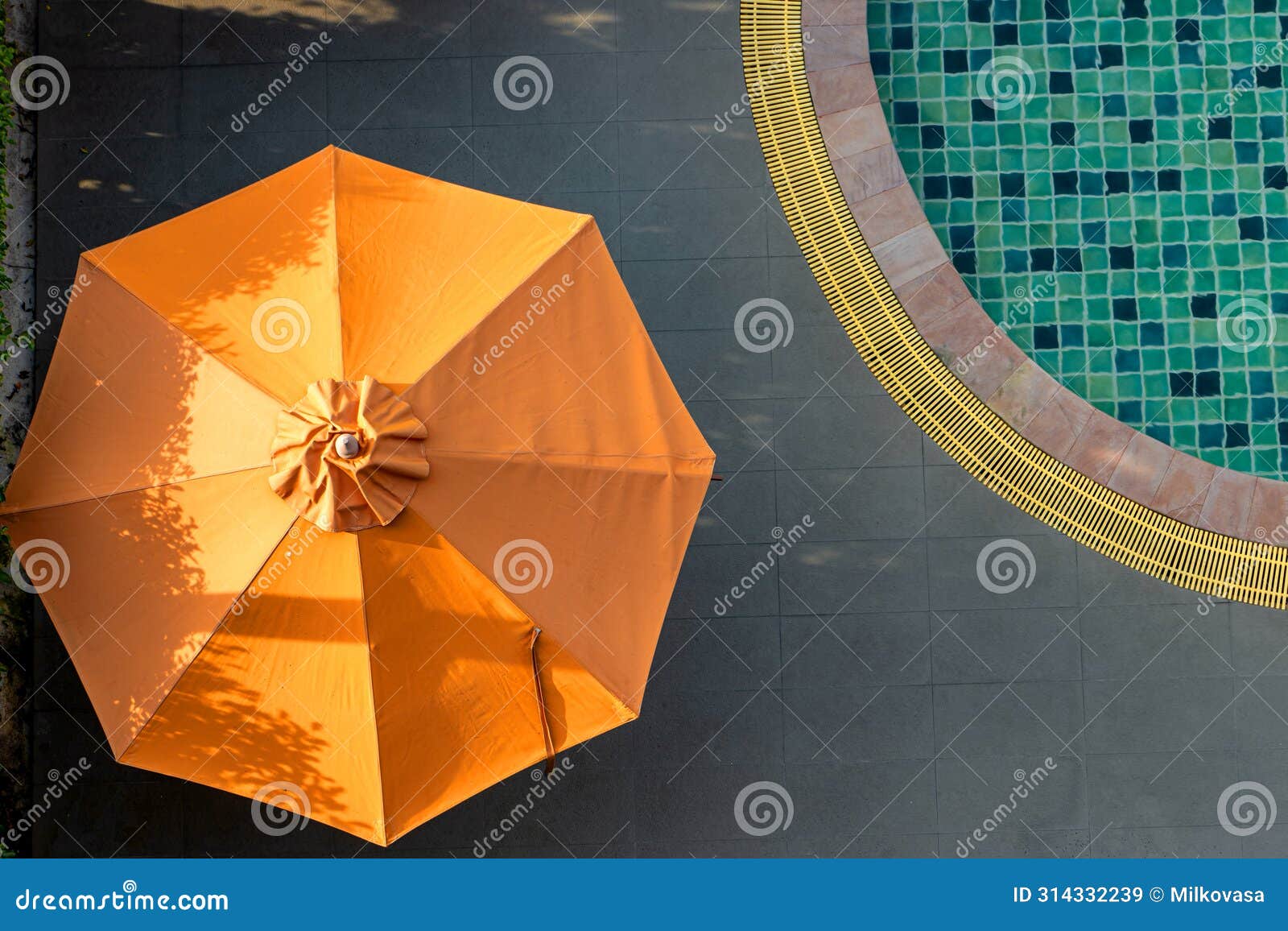 An Open Parasol by the Swimming Pool at Sunset Stock Image - Image of ...