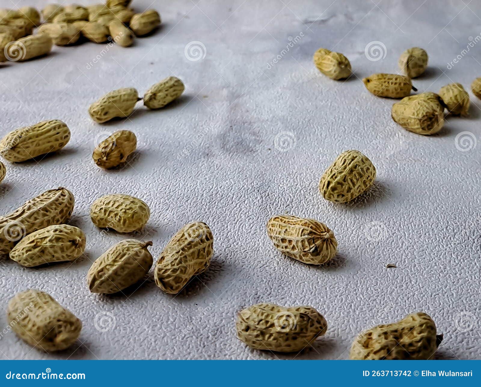Open Peanuts Shot Macro in Studio, White Wall Texture Background Stock ...